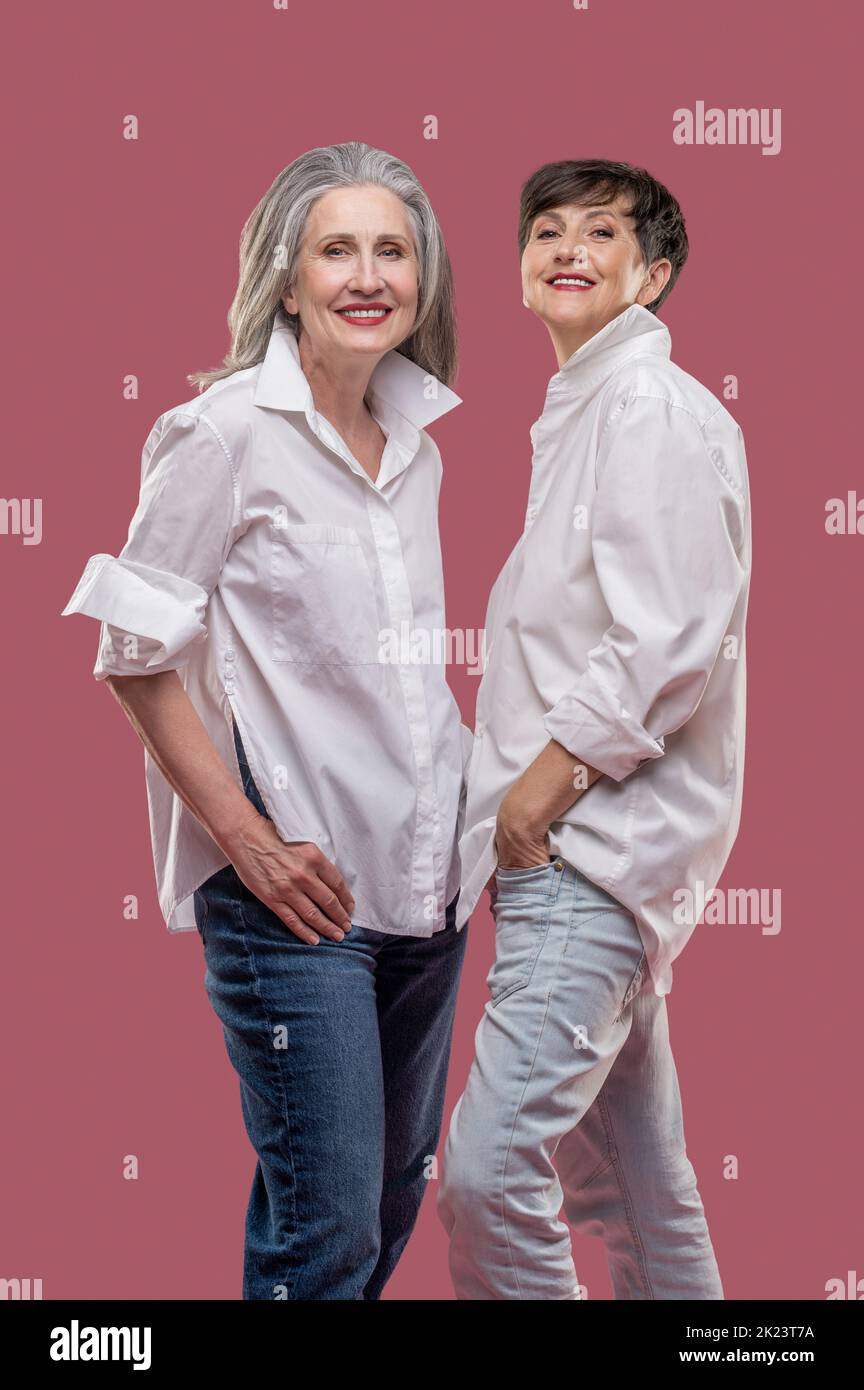 Two people in white shirts hi-res stock photography and images - Alamy
