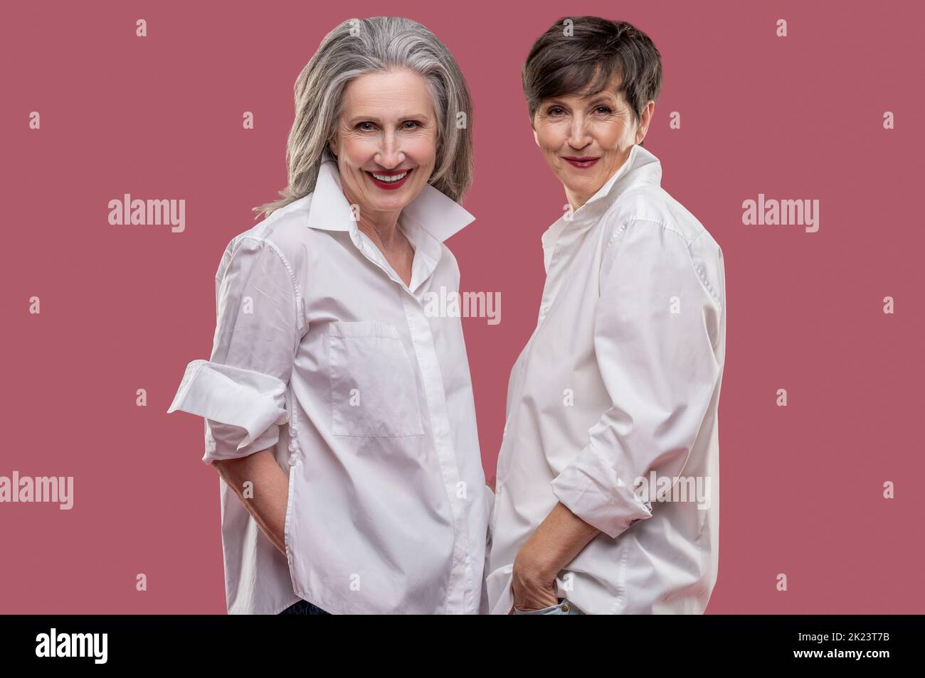 Two women in shirts hi-res stock photography and images - Alamy