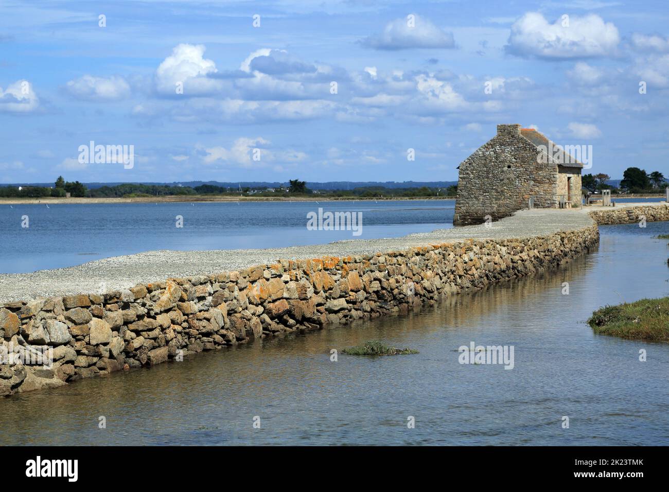 Watermill Moulin a maree de Berno and sea wall alongside the etang du ...