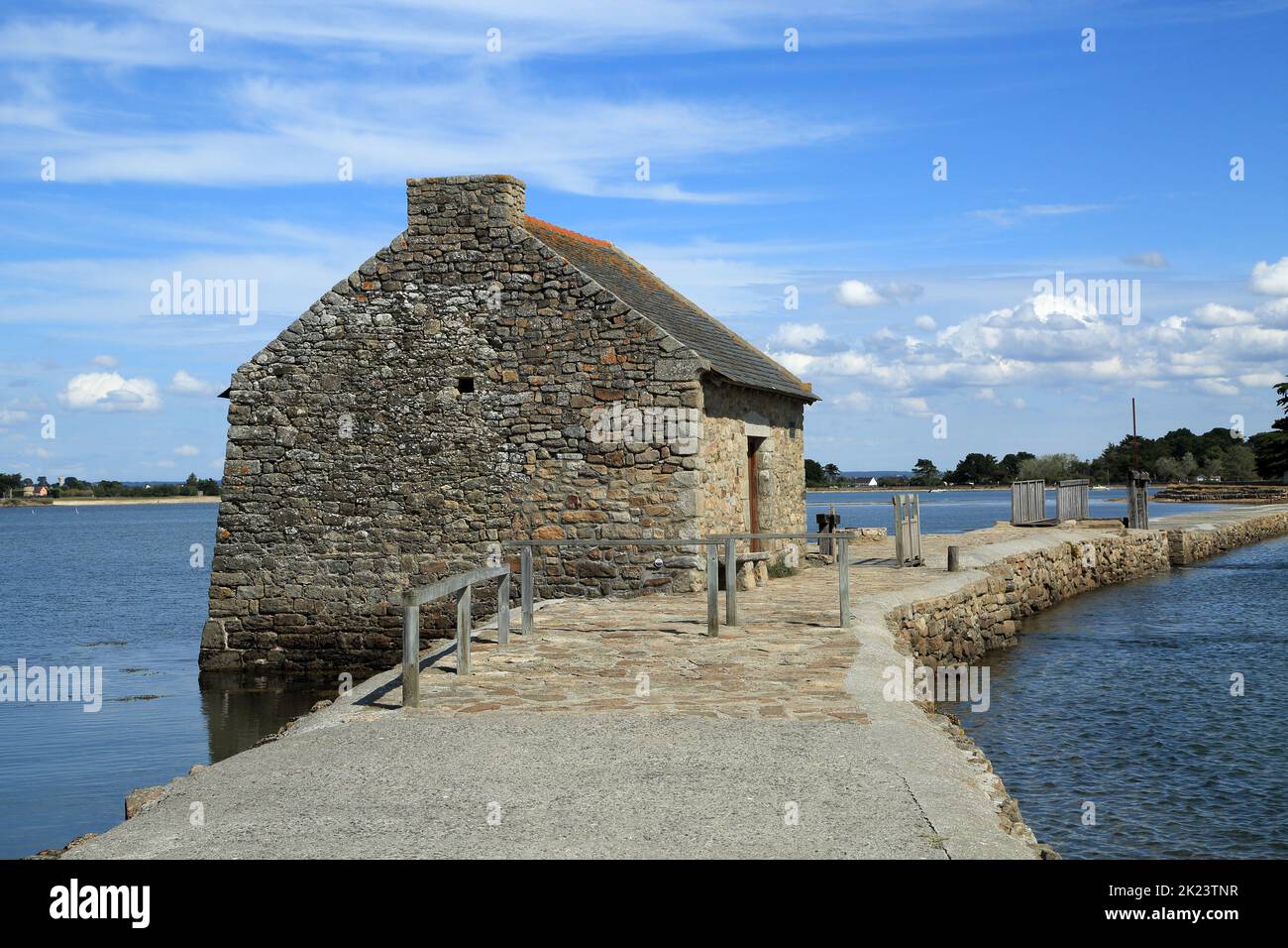 Watermill Moulin a maree de Berno and sea wall alongside the etang du ...