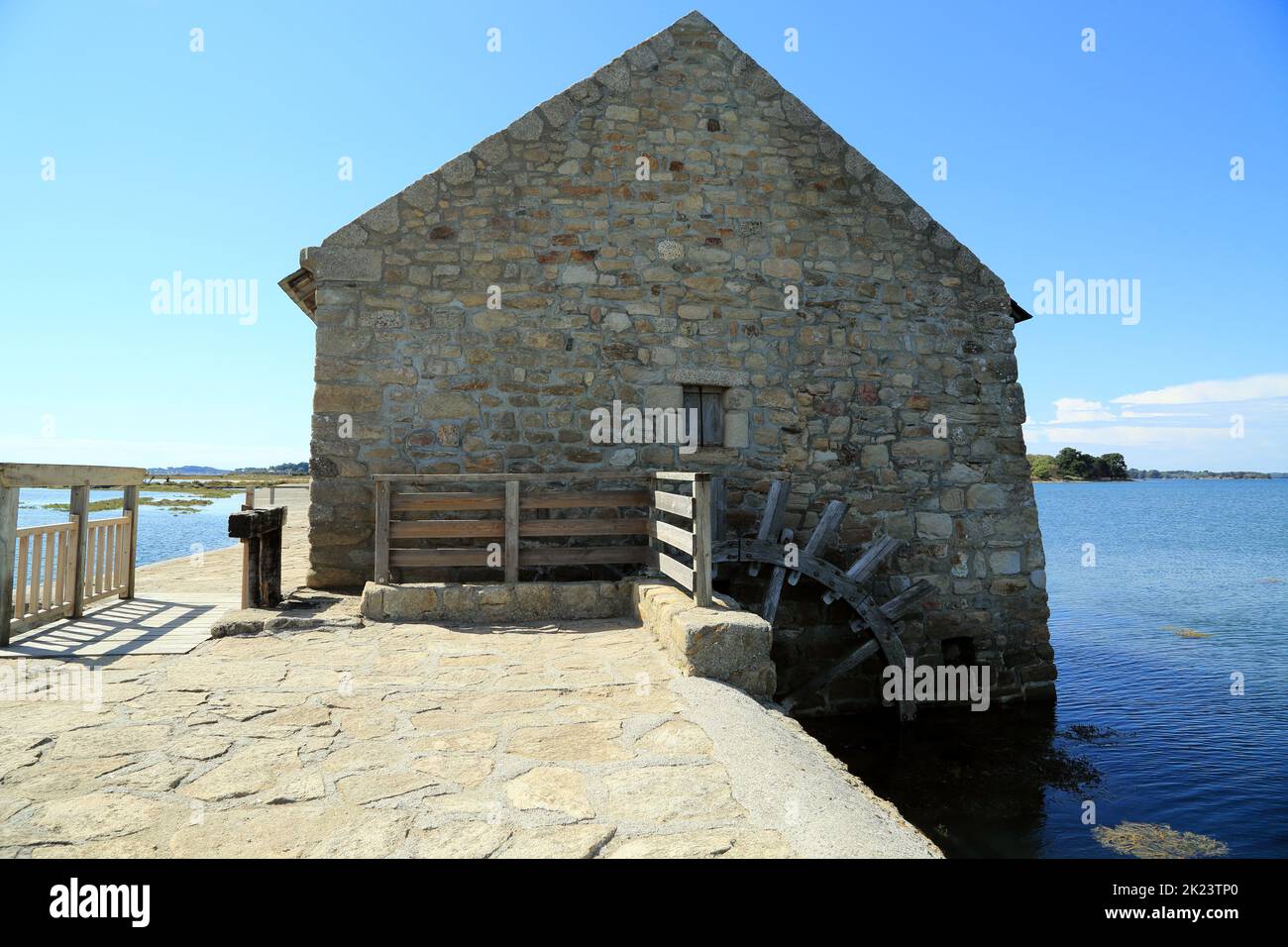 Watermill Moulin a maree de Berno and sea wall alongside the etang du ...