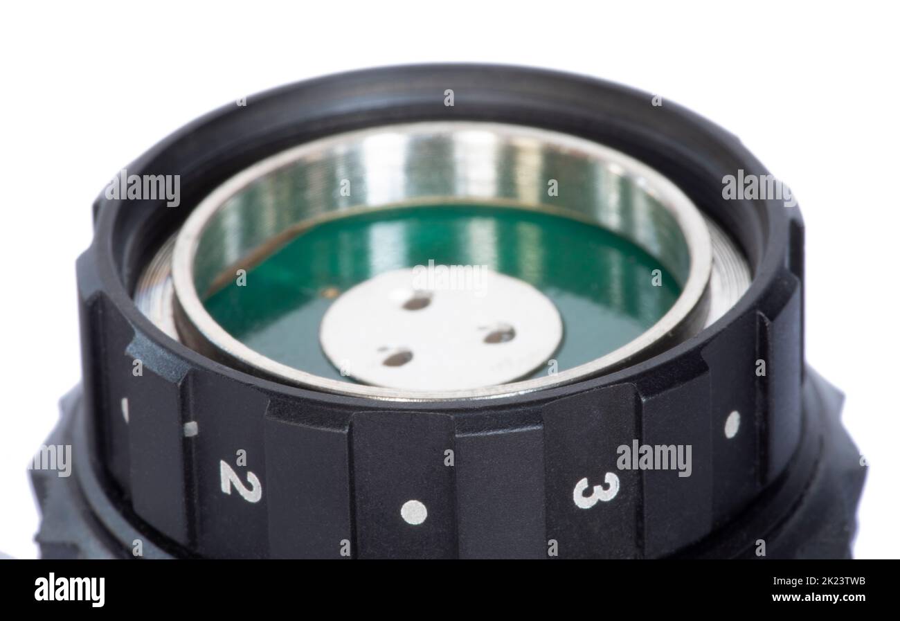 Battery compartment for a lighted reticle on a riflescope isolated on ...