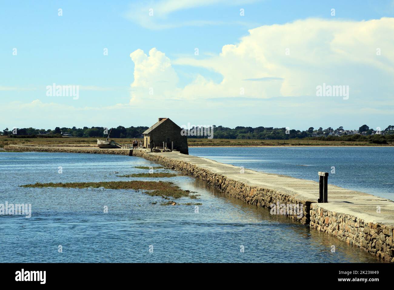 Watermill Moulin a maree de Berno and sea wall alongside the etang du ...