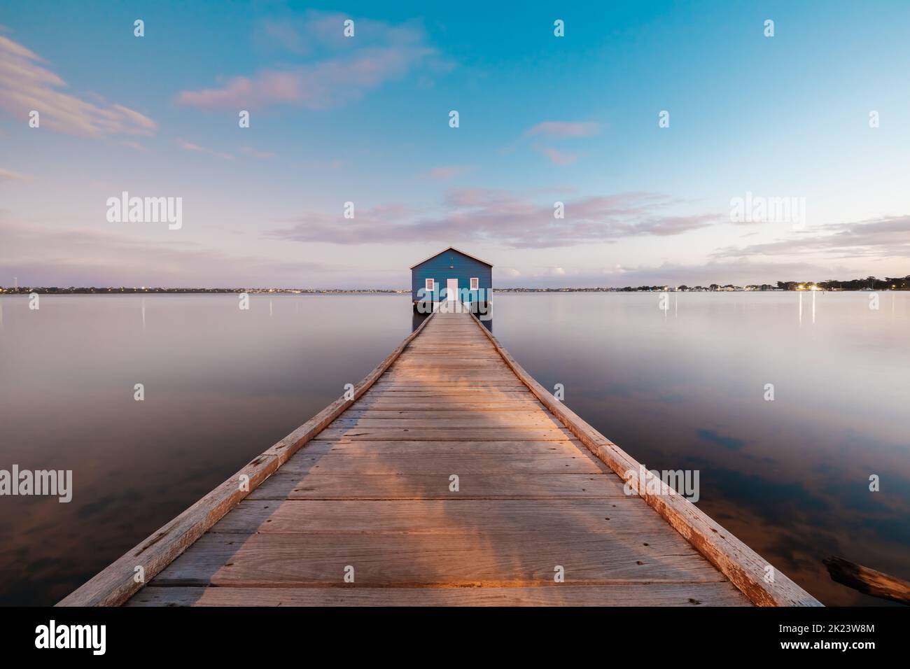 Sunset, jetty, and blue boat house in Perth, Western Australia Stock ...