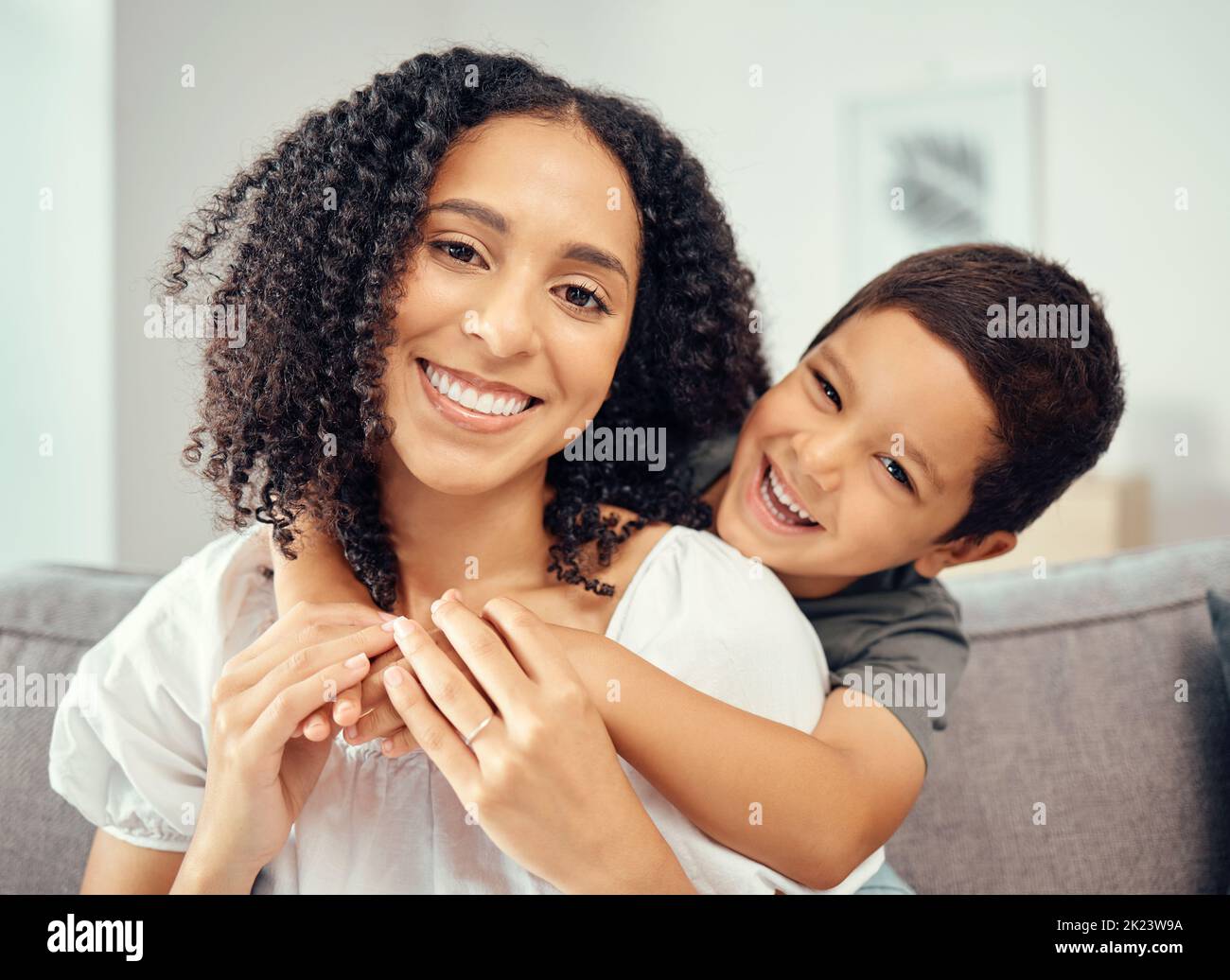 Happy kid hug mom for mothers day, love and care while relaxing ...
