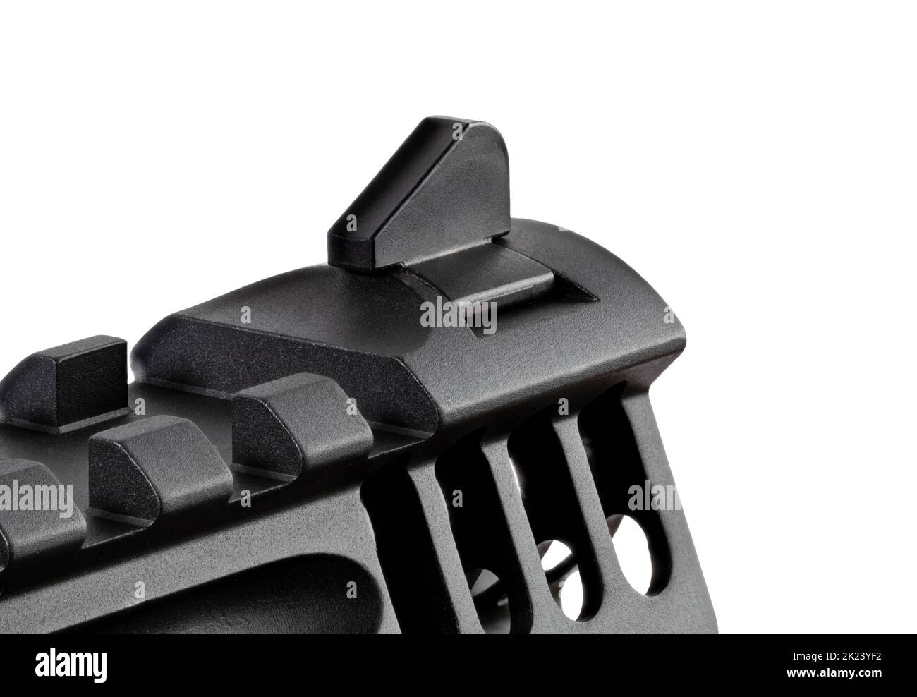 Close view at an angle of the front sight and gas ports on a semi ...
