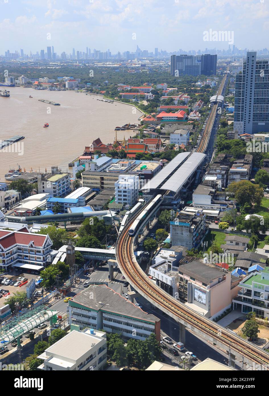 Panorama view of rail tracks and station of sky train heading towards ...