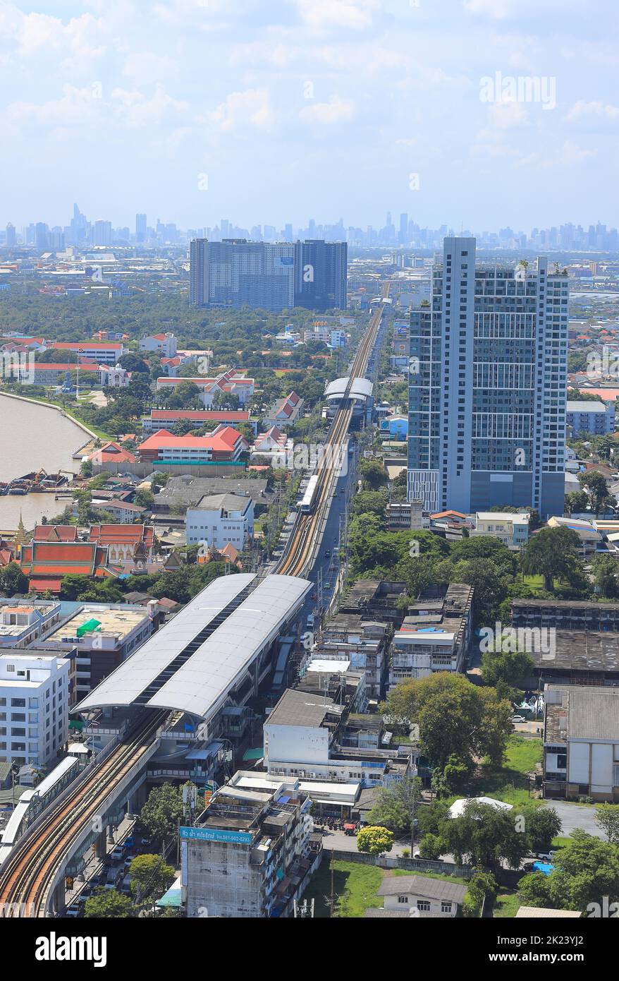 Panorama view of rail tracks and station of sky train heading towards ...