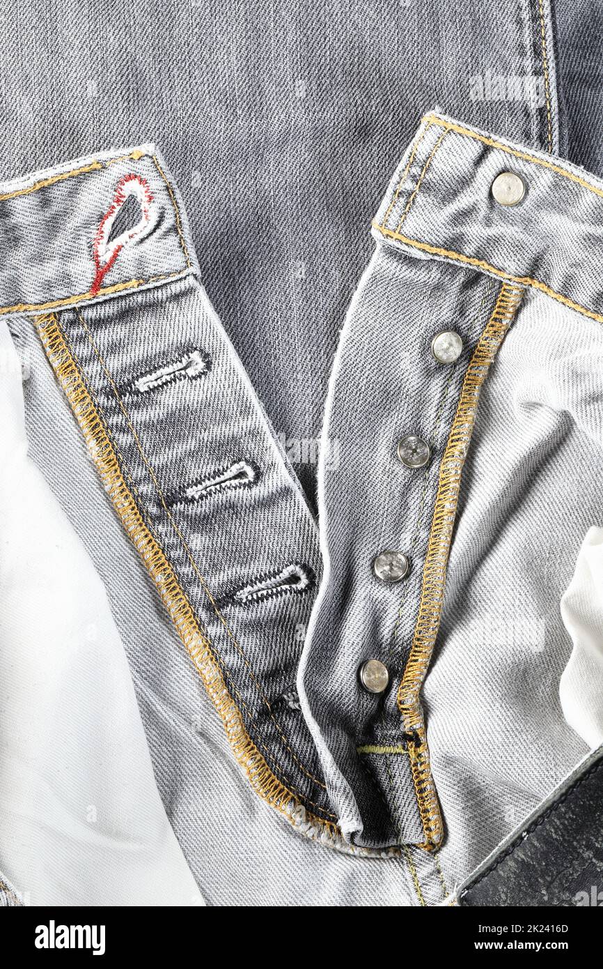 Close up Fashion Buttons on jeans, denim with seam of fashion design ...
