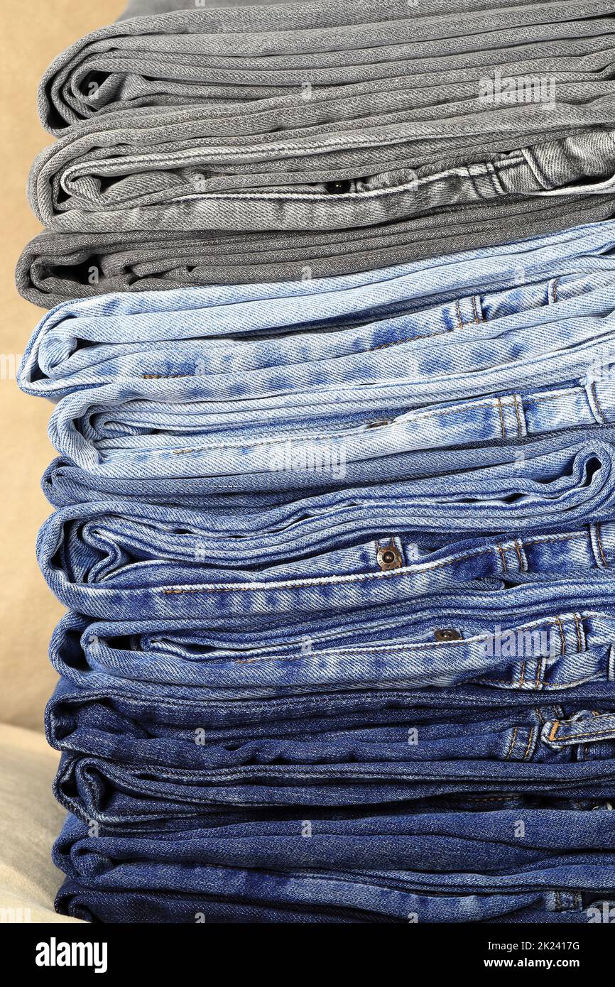 Stack of denim Blue jeans detail, pattern, texture, Background of denim ...