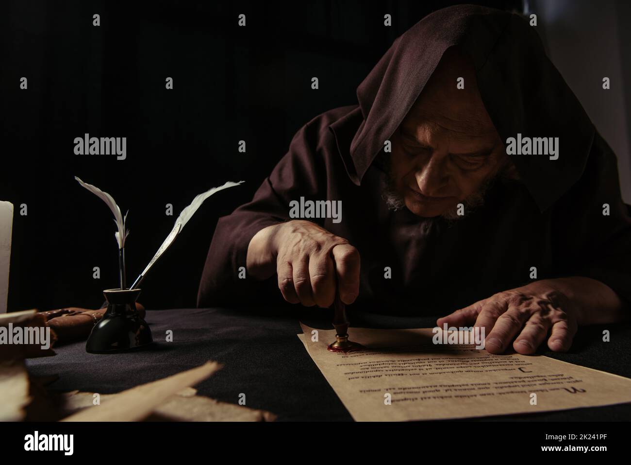 Medieval man papers hi-res stock photography and images - Alamy