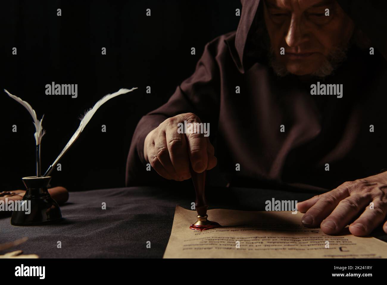 Medieval man papers hi-res stock photography and images - Alamy