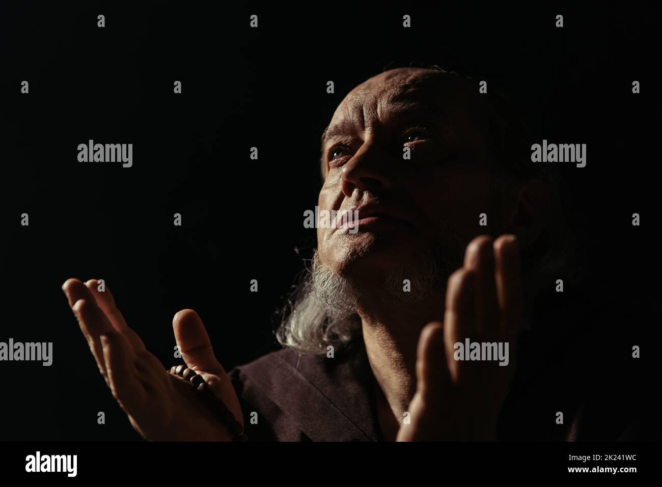 Priest looking up isolated hi-res stock photography and images - Alamy