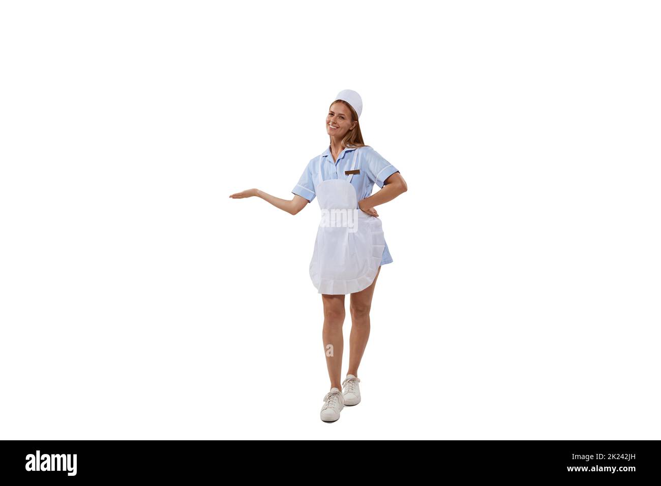 Portrait of beautiful young woman, saleswoman in a candy store in ...