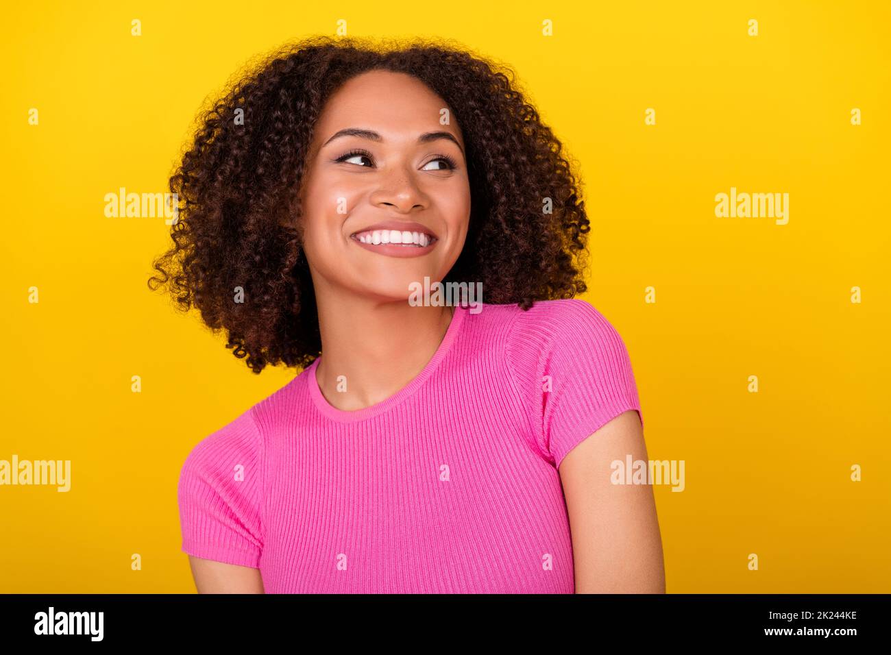 Portrait of cute positive lady toothy smile look interested empty space ...