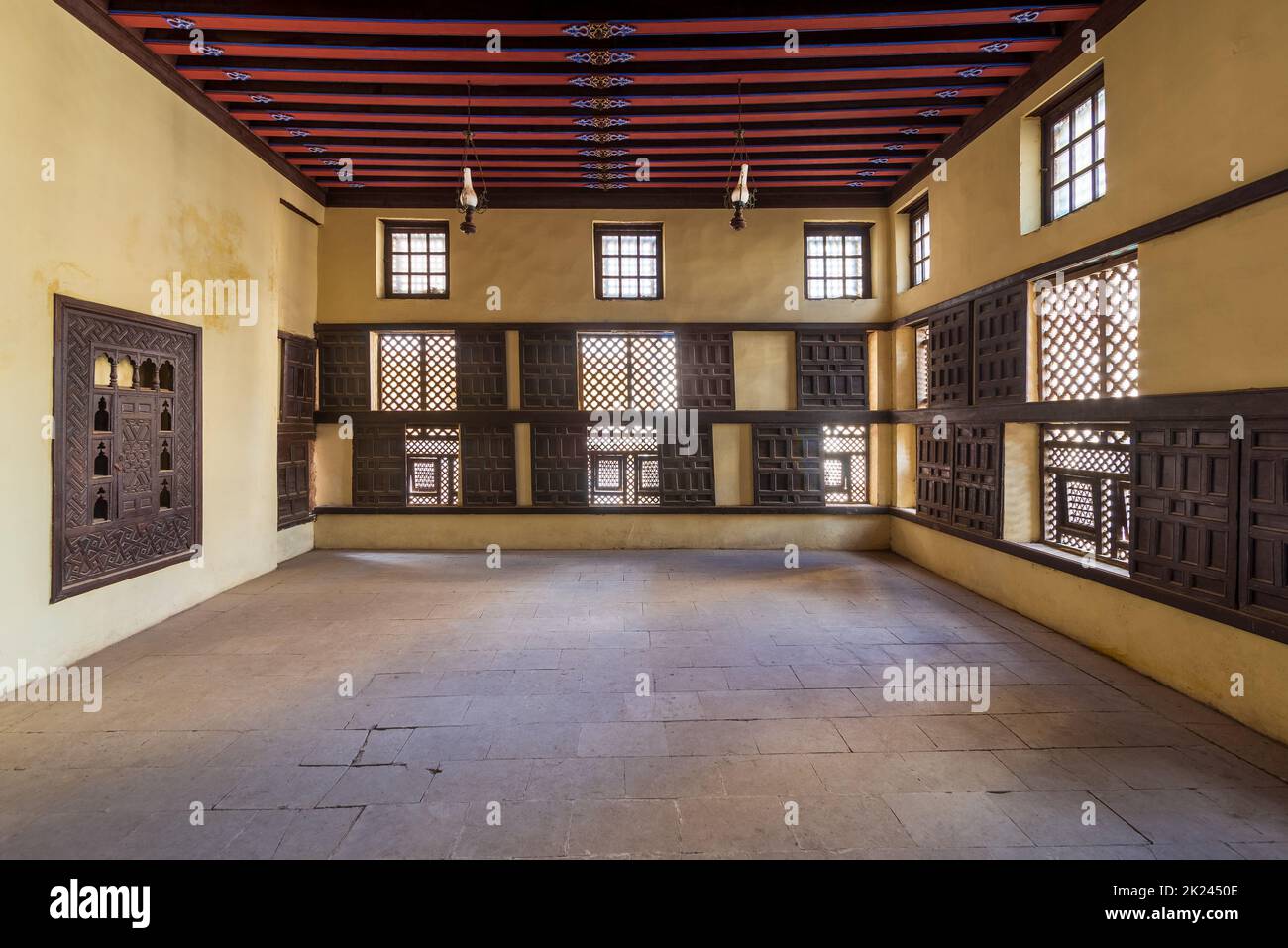 Interior wall with decorated lattice wooden windows, Mashrabiya, and ...