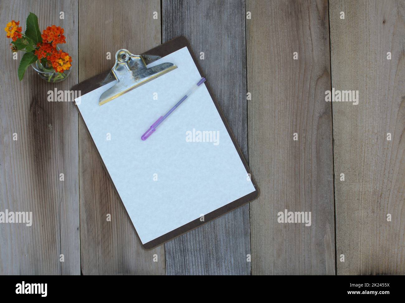 Clipboard With Blank Sheet of Paper on Wooden Table With Flowers Flat ...