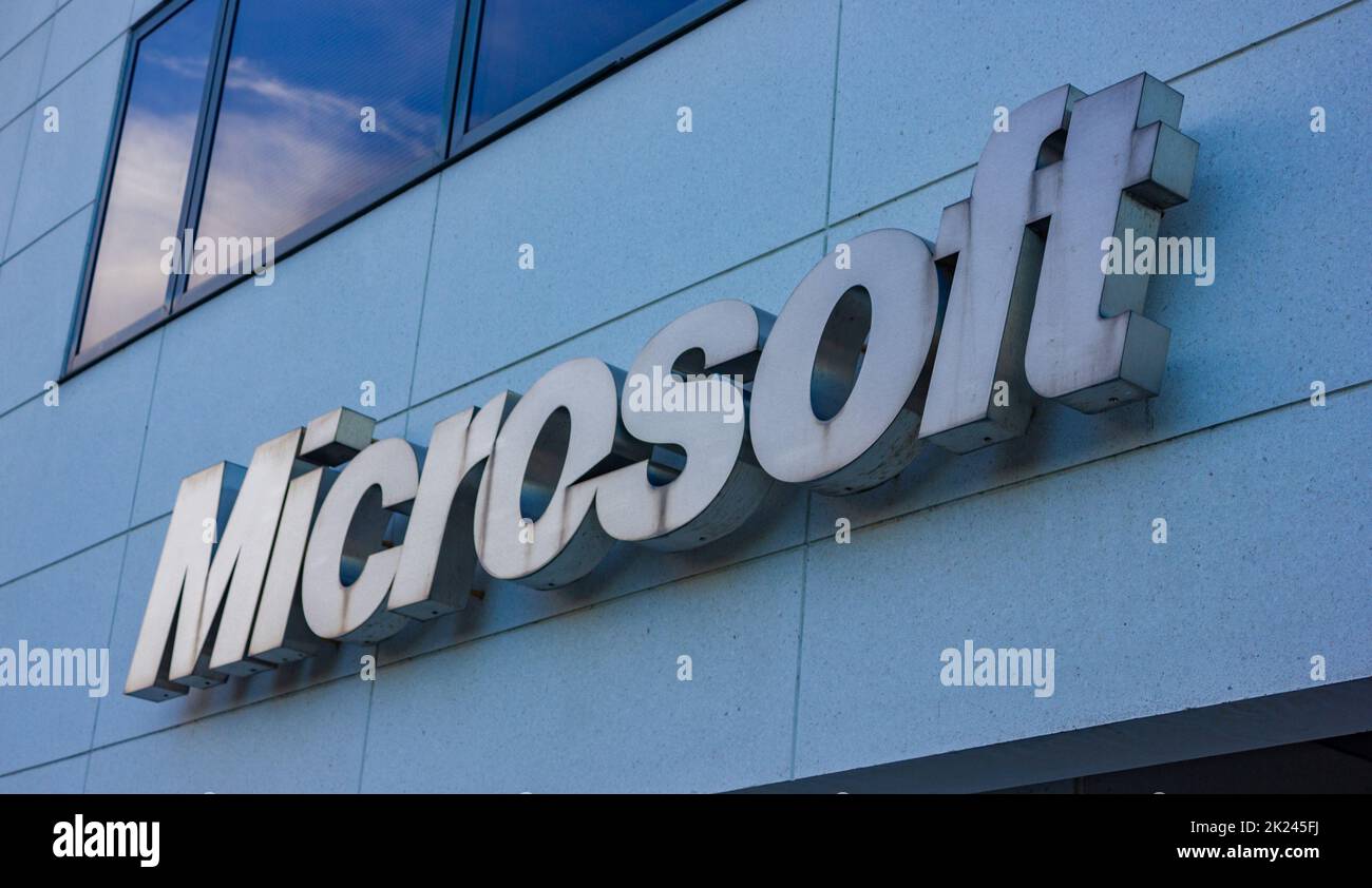 A picture of the Microsoft logo outside a building, in Dublin Stock ...
