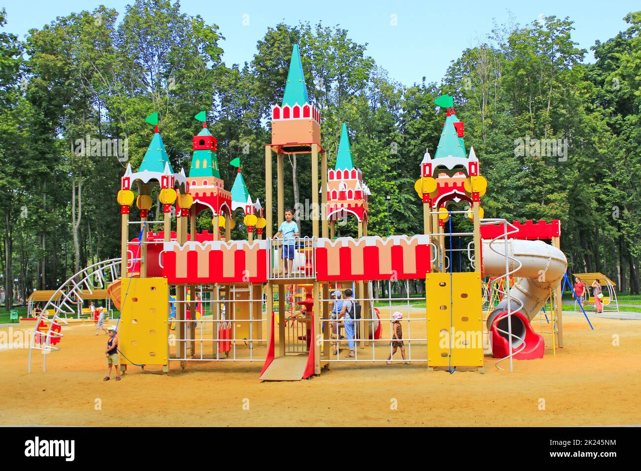 Children's playground in city park. Palace on playground. Fun for young ...