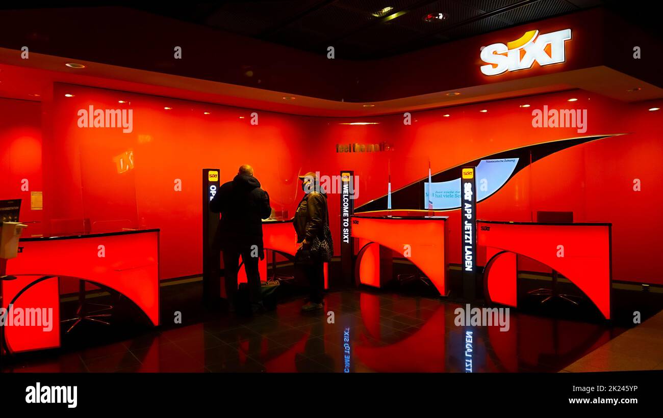 Dortmund, Germany - December 28, 2021: Sixt car rental employee waits ...