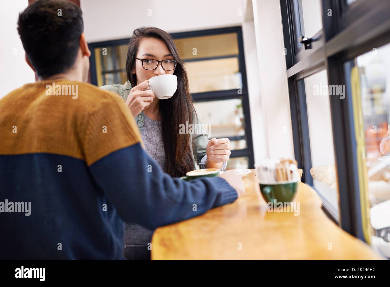 Two stylish young men sitting hi-res stock photography and images - Alamy