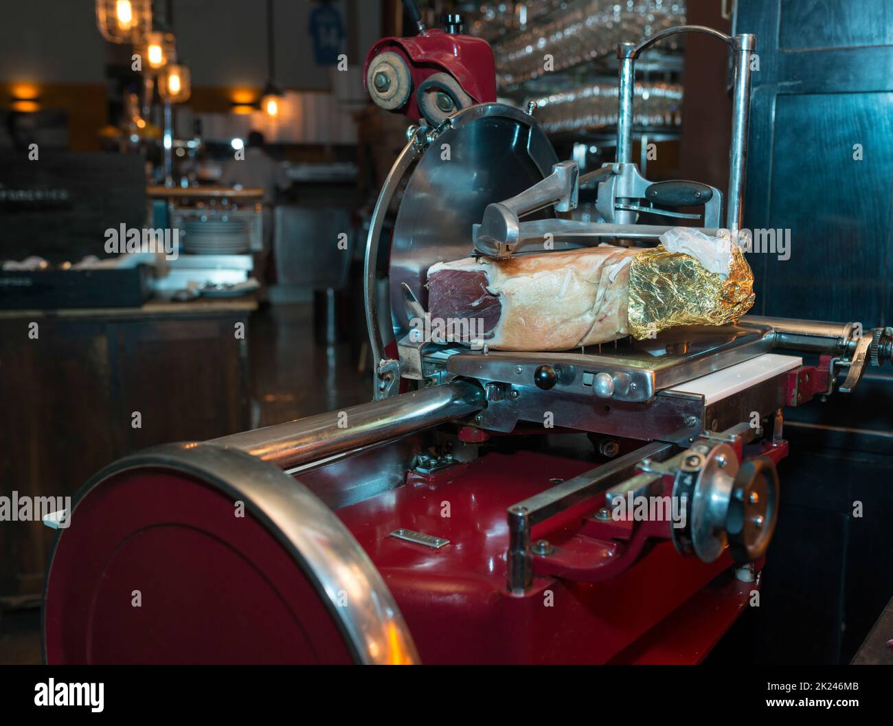 An old traditional hand-operated slicer in an Italian restaurant Stock ...