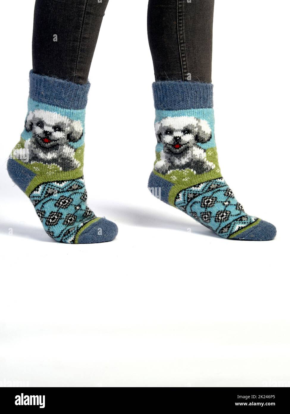 Wool socks worn on women's feet. High quality photo Stock Photo - Alamy