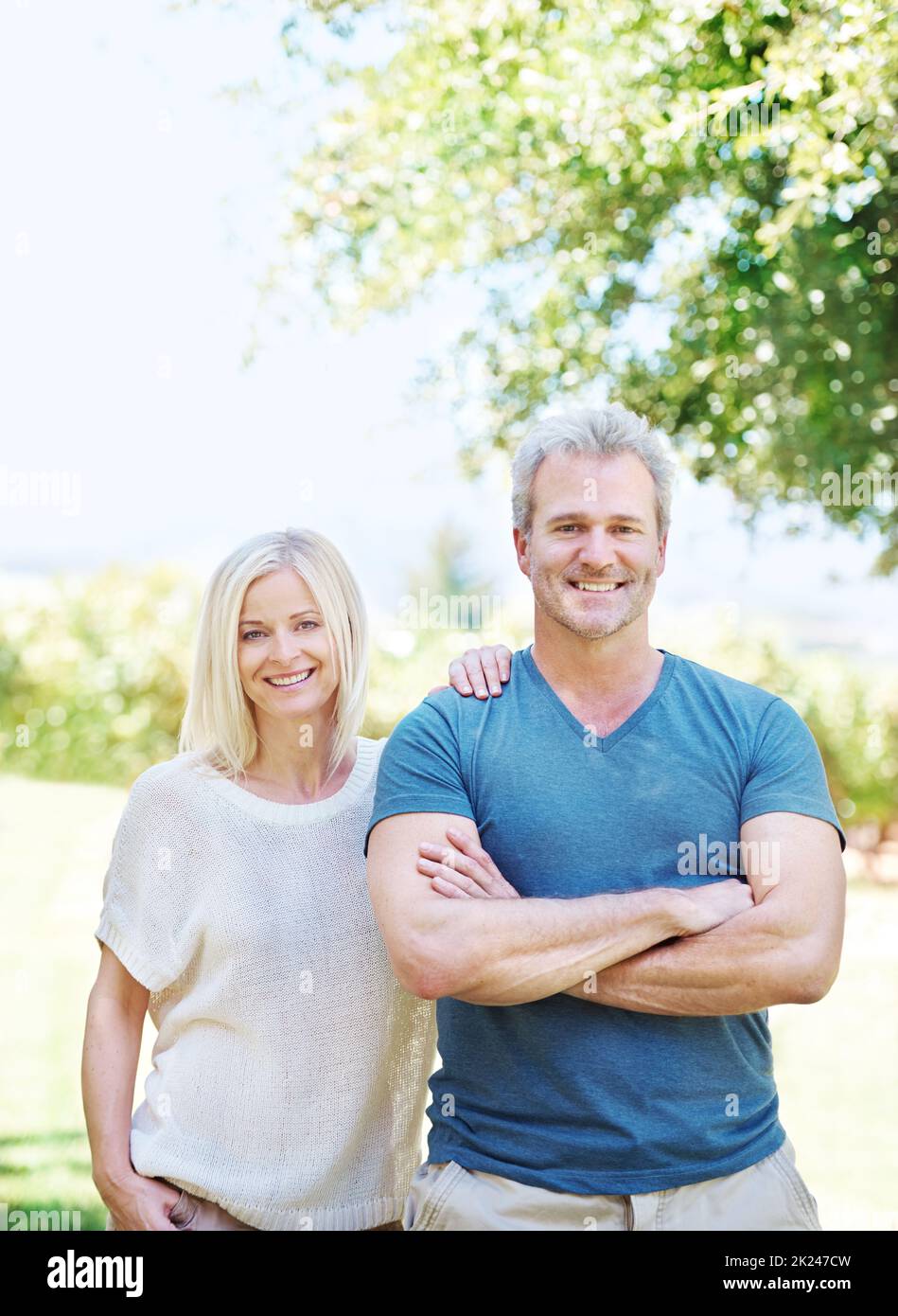 Content with the life theyve built. A happy mature couple standing ...