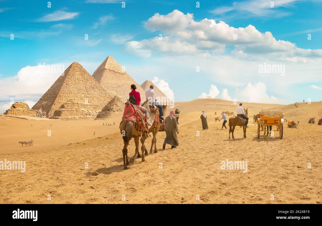 Egyptian pyramids in the desert at sunset Stock Photo - Alamy