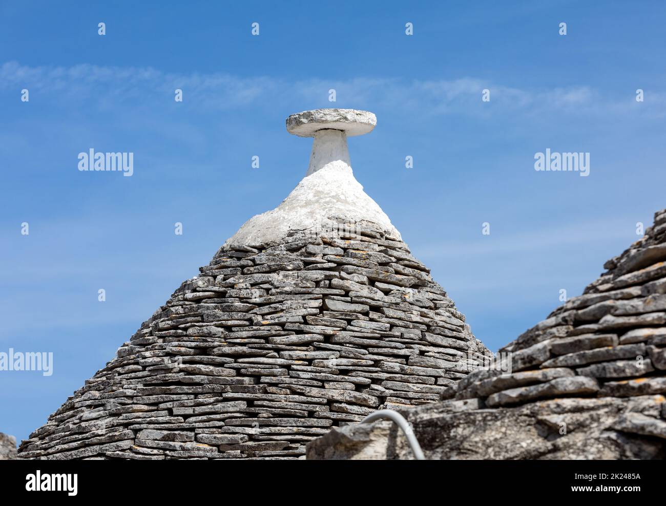 Stone roofs of Trulli Houses in Alberobello; Italy. The style of ...