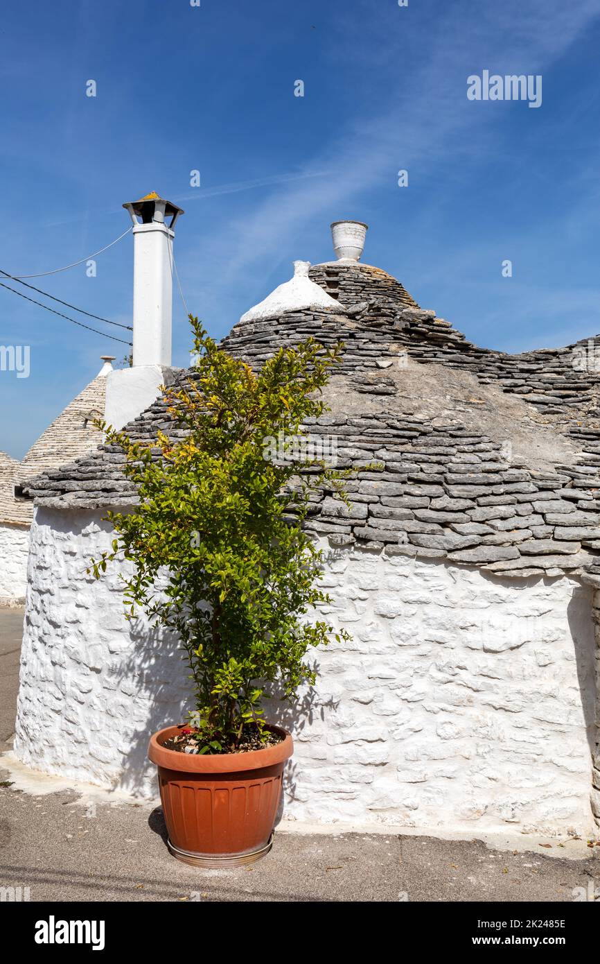 Trulli village in Alberobello, Italy. The style of construction is ...