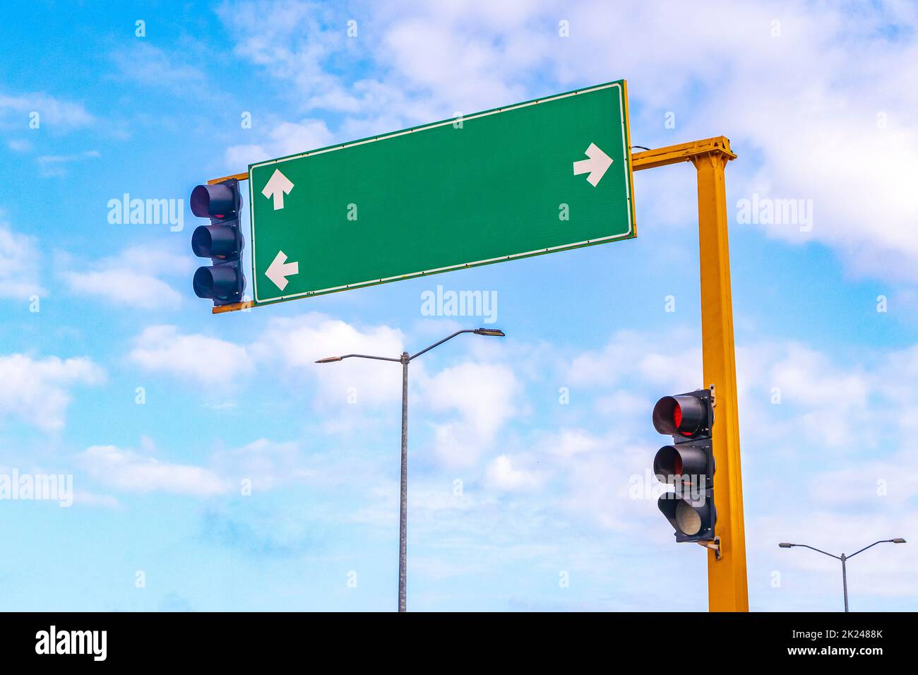 Green turquoise blank empty road sign at the highway in the city of ...