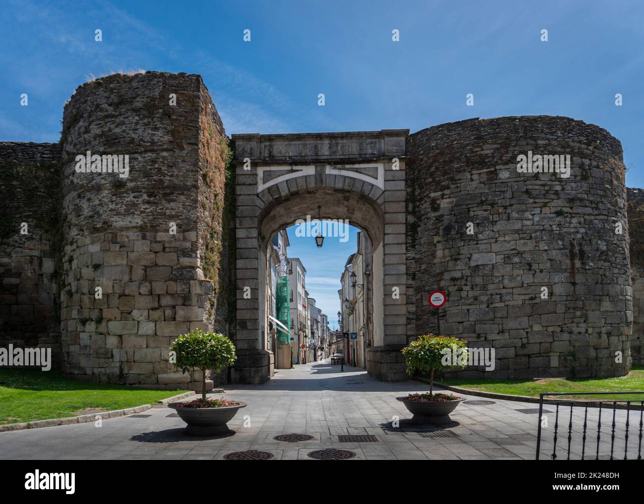 Stone gateway in the city walls in the city of Lugo, Spain Stock Photo ...