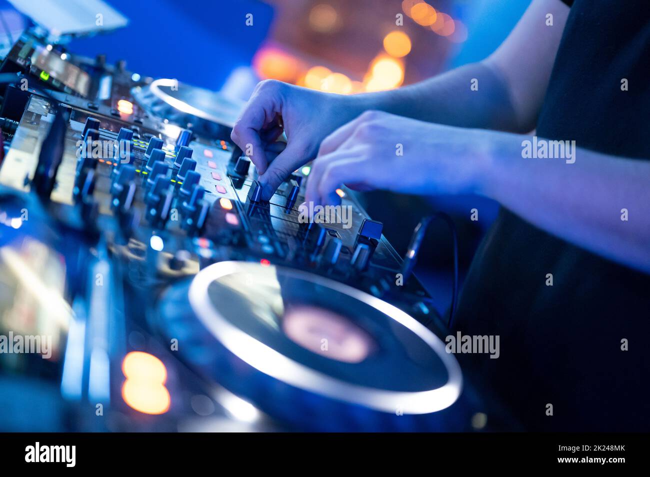 Dj mixing at party festival with light and smoke in background - Summer ...