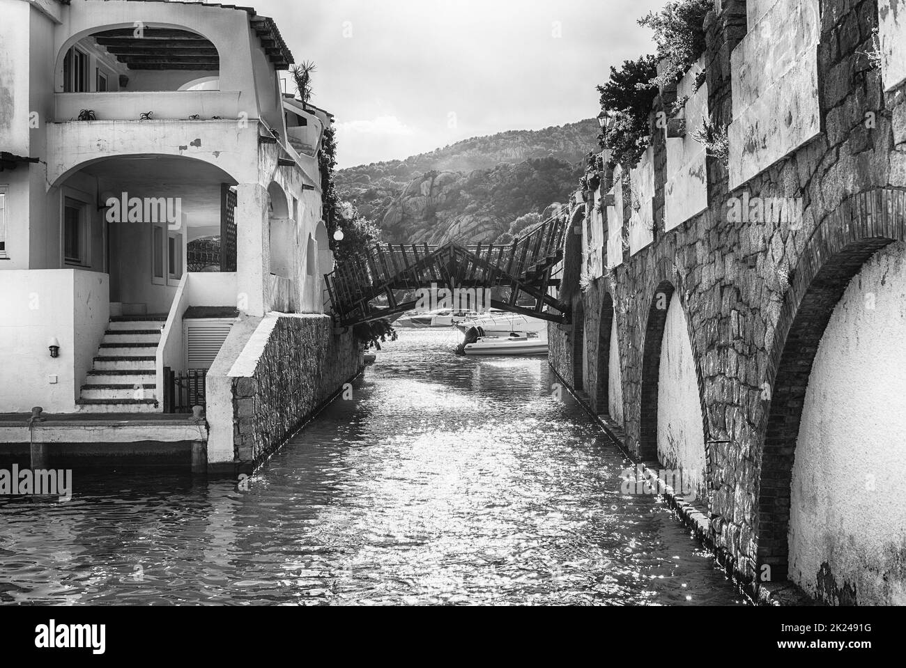 View of the harbor with luxury yachts of Poltu Quatu, Sardinia, Italy ...