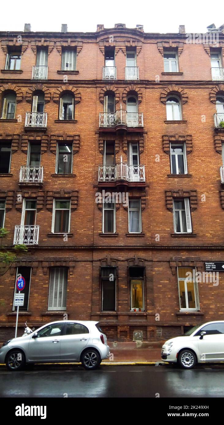 Facade view of a neoclassical brick building, in Republica Arabe and ...