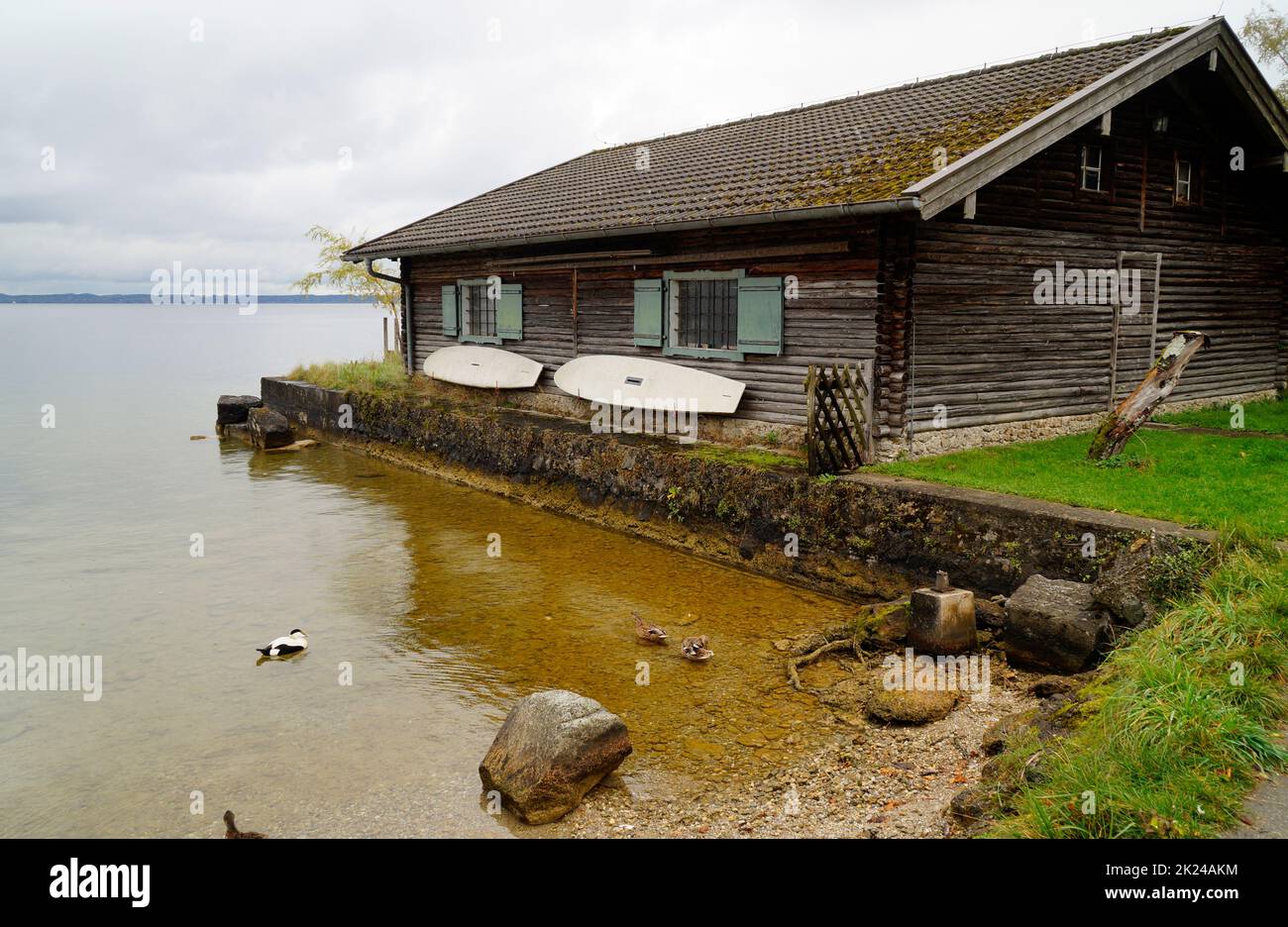 a boat house on island Fraueninsel or Frauenchiemesee on lake Chiemsee ...