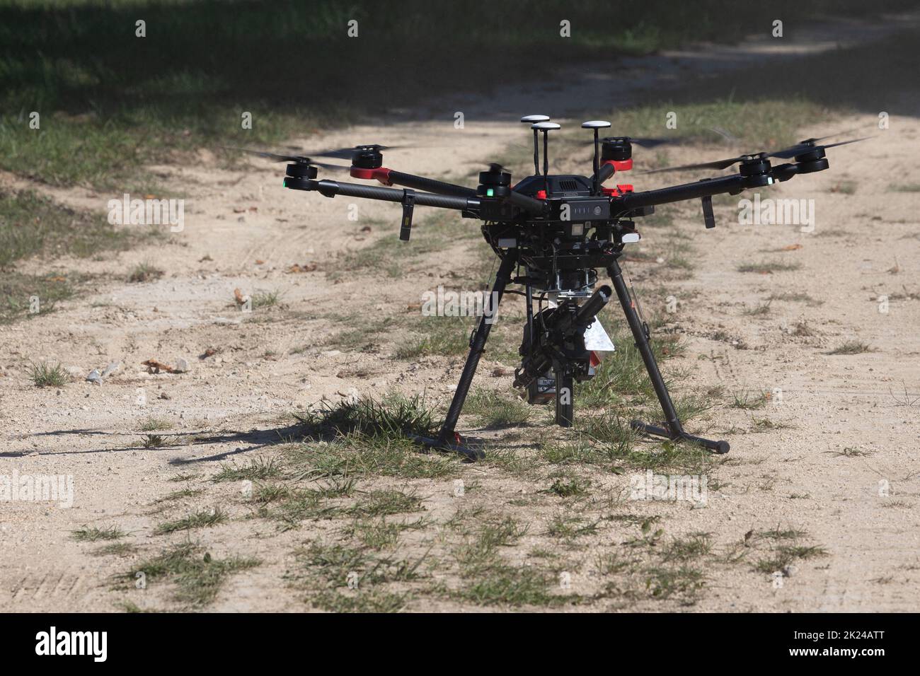 Presentation of a dynamic mini drone AVATAR with a HK 416 rifle during ...