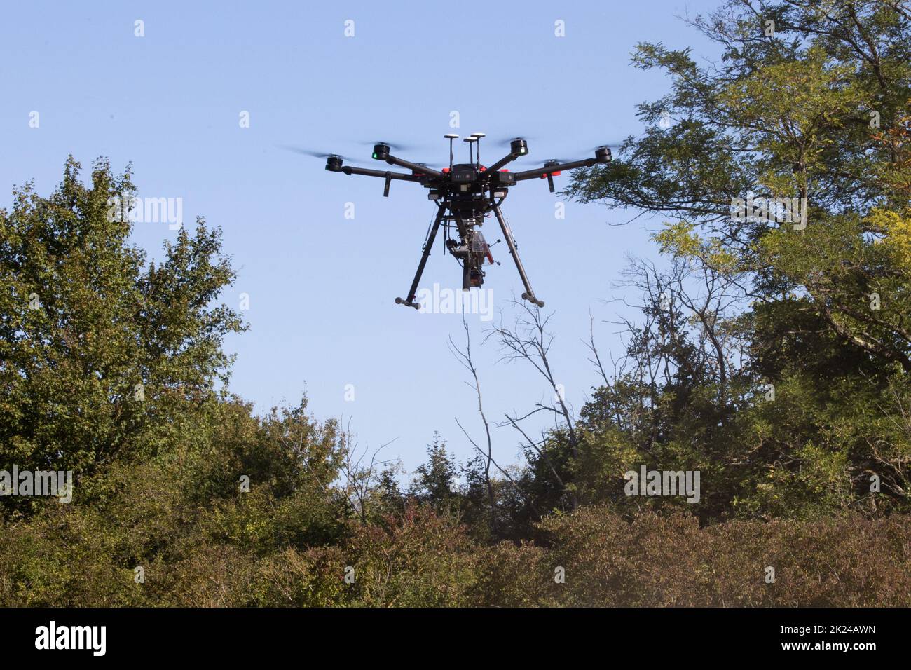 Presentation of a dynamic mini drone AVATAR with a HK 416 rifle during ...