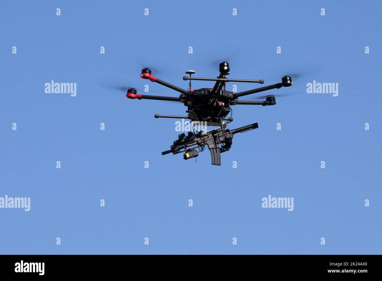 Presentation of a dynamic mini drone AVATAR with a HK 416 rifle during ...