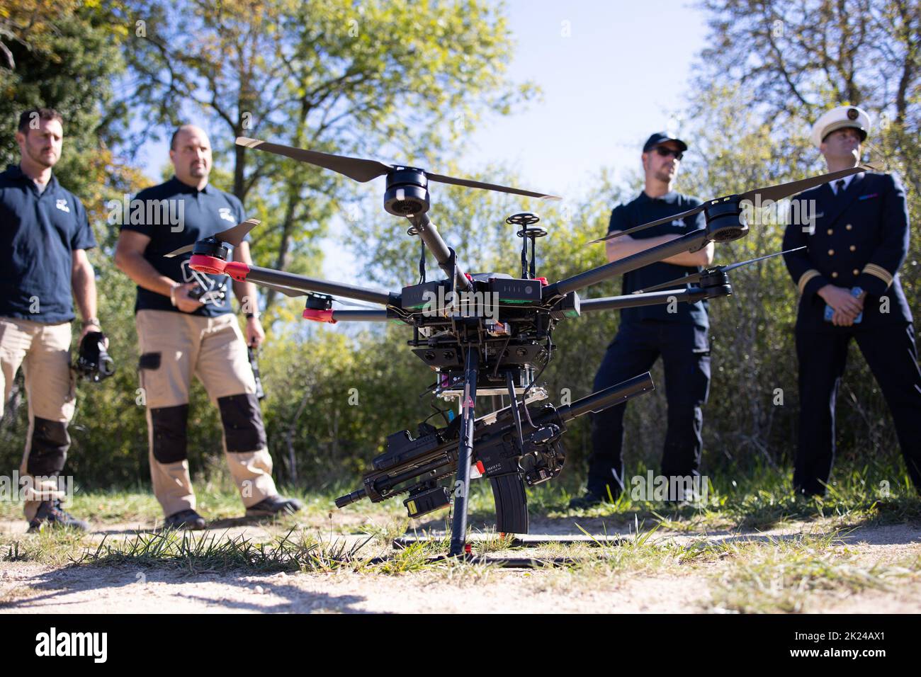 Presentation of a dynamic mini drone AVATAR with a HK 416 rifle during ...