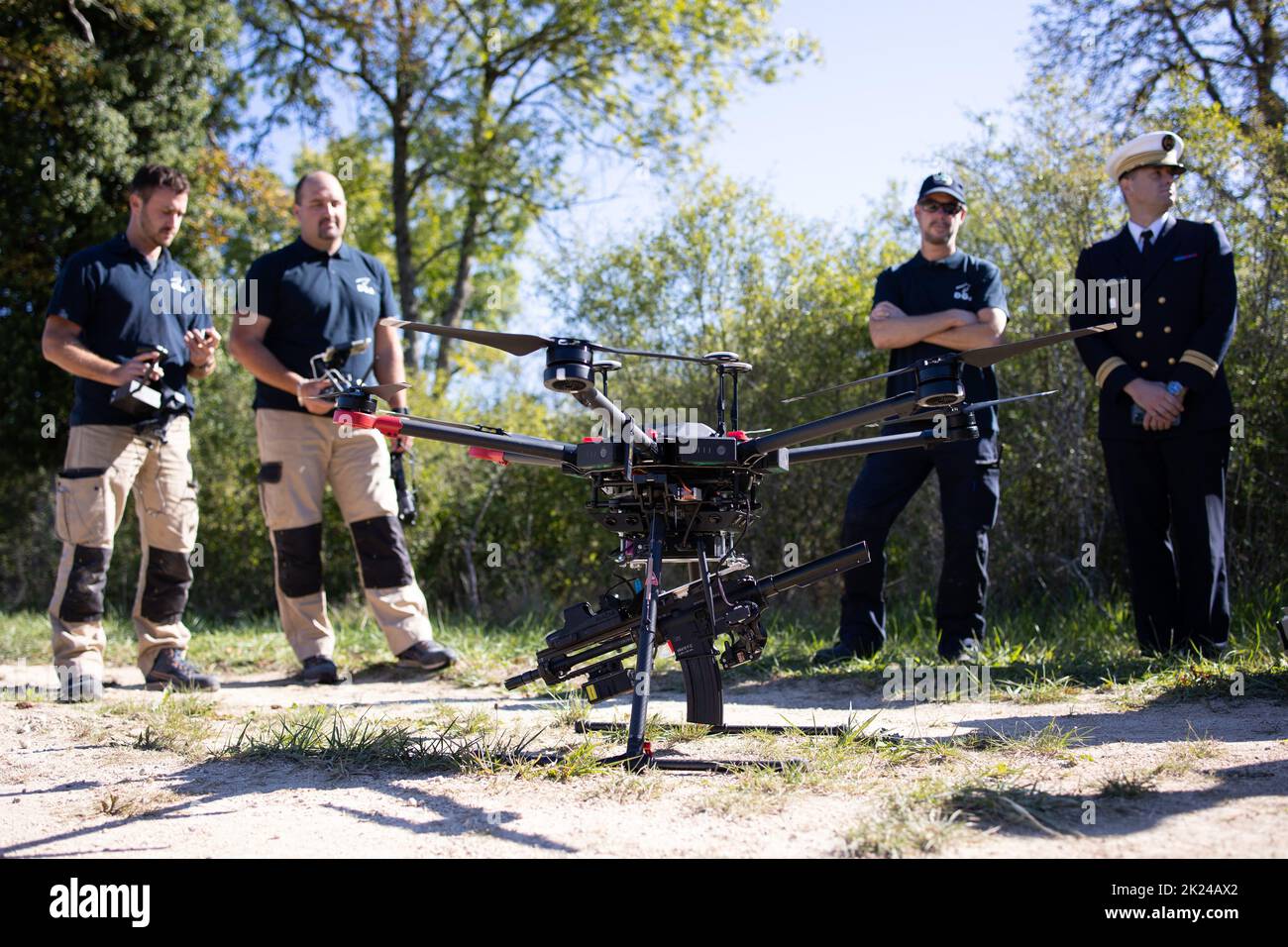 Presentation of a dynamic mini drone AVATAR with a HK 416 rifle during ...