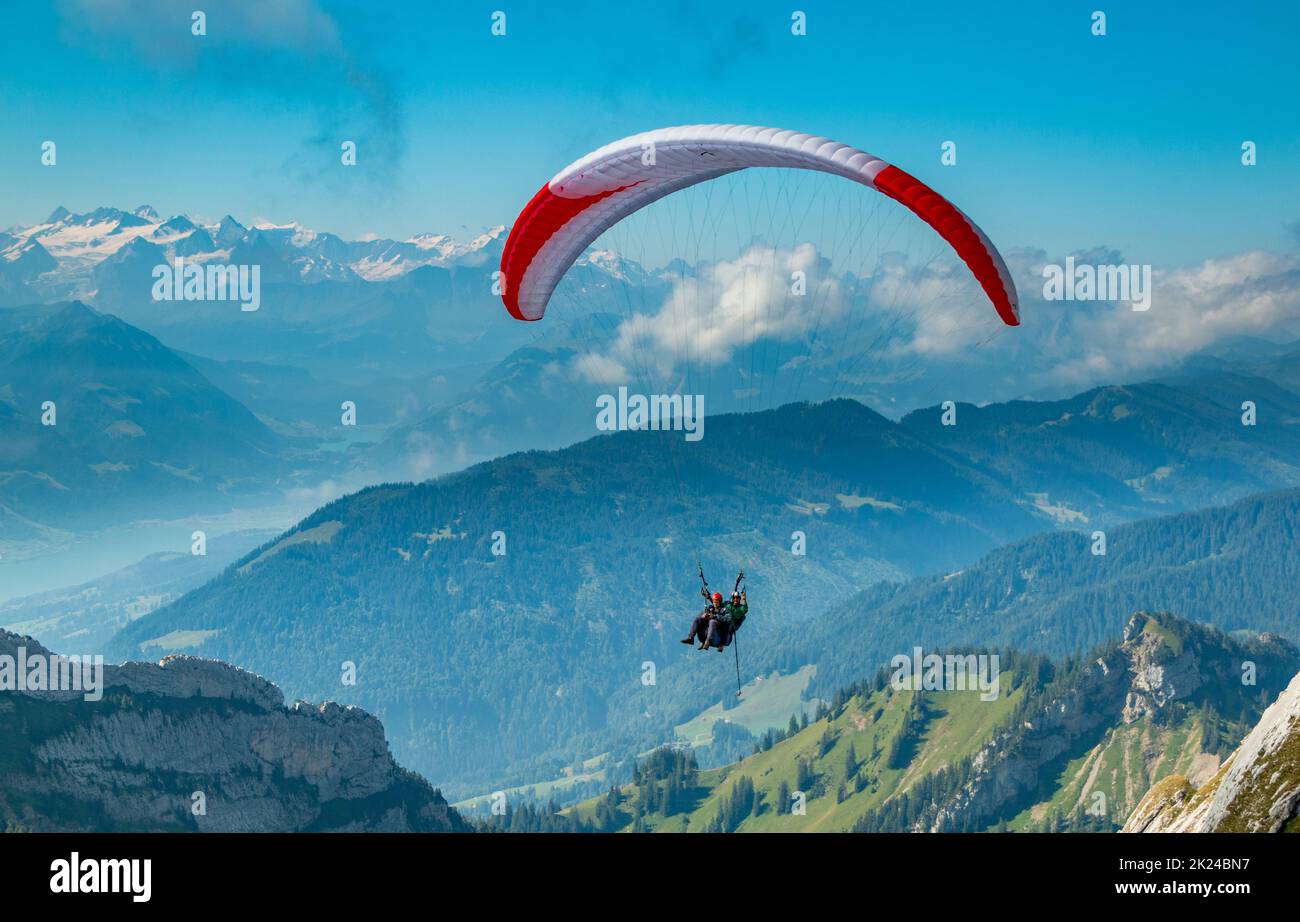 A picture of people paragliding at the top of Mount Pilatus Stock Photo ...