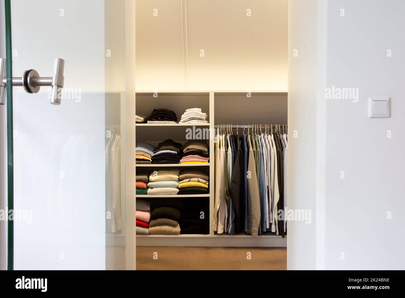walk -in closet with cloth and shelf at home modern stylish white ...