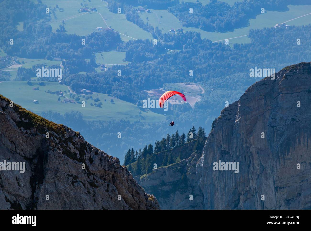 A picture of people paragliding at the top of Mount Pilatus Stock Photo ...