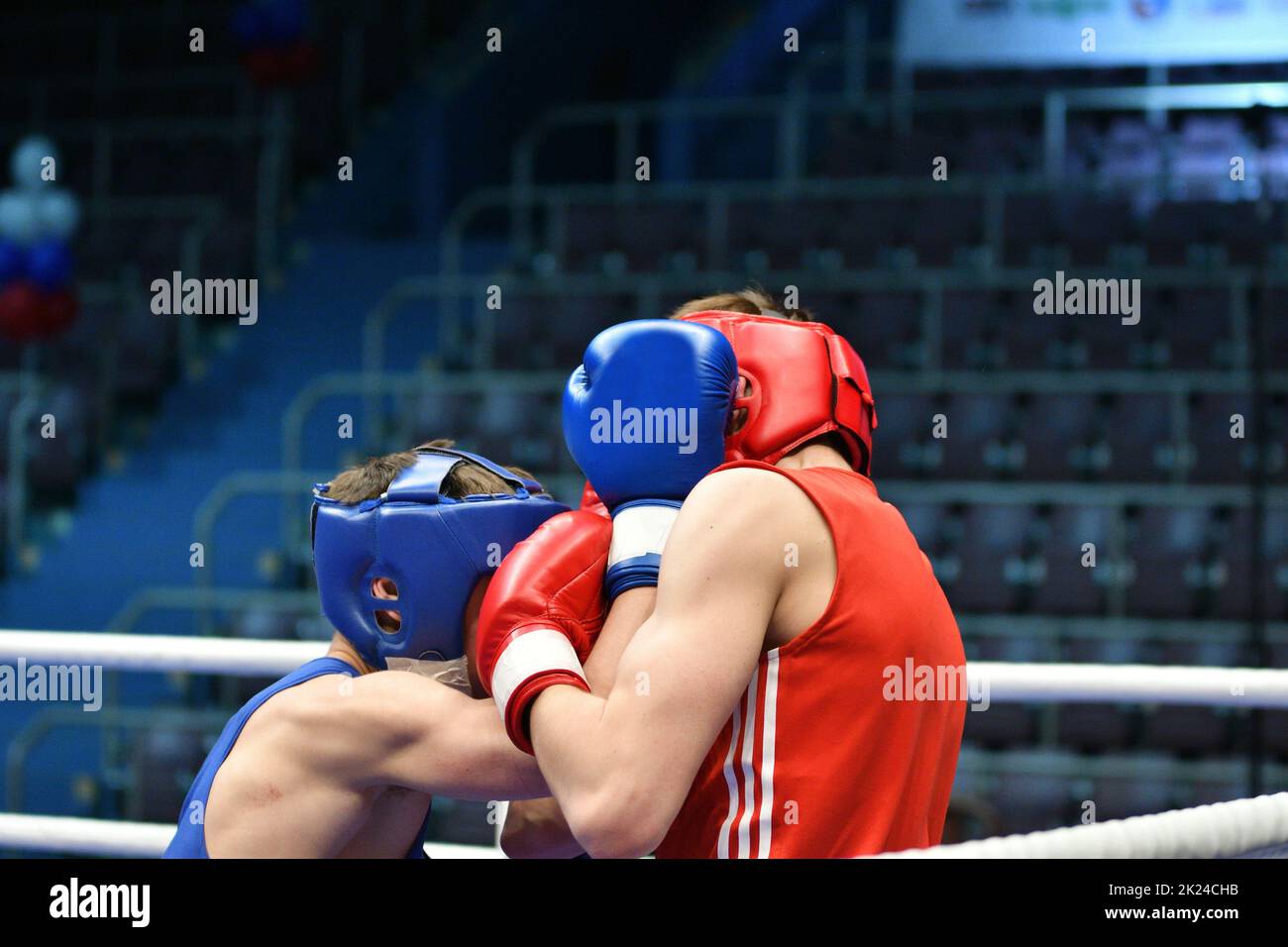 Two young boxers compete in a boxing ring Stock Photo - Alamy