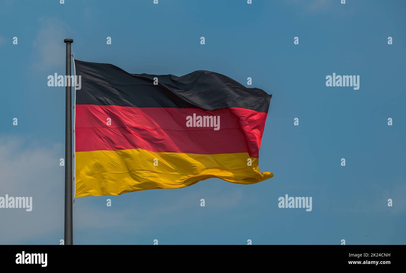 A picture of the German flag waving in the air Stock Photo - Alamy