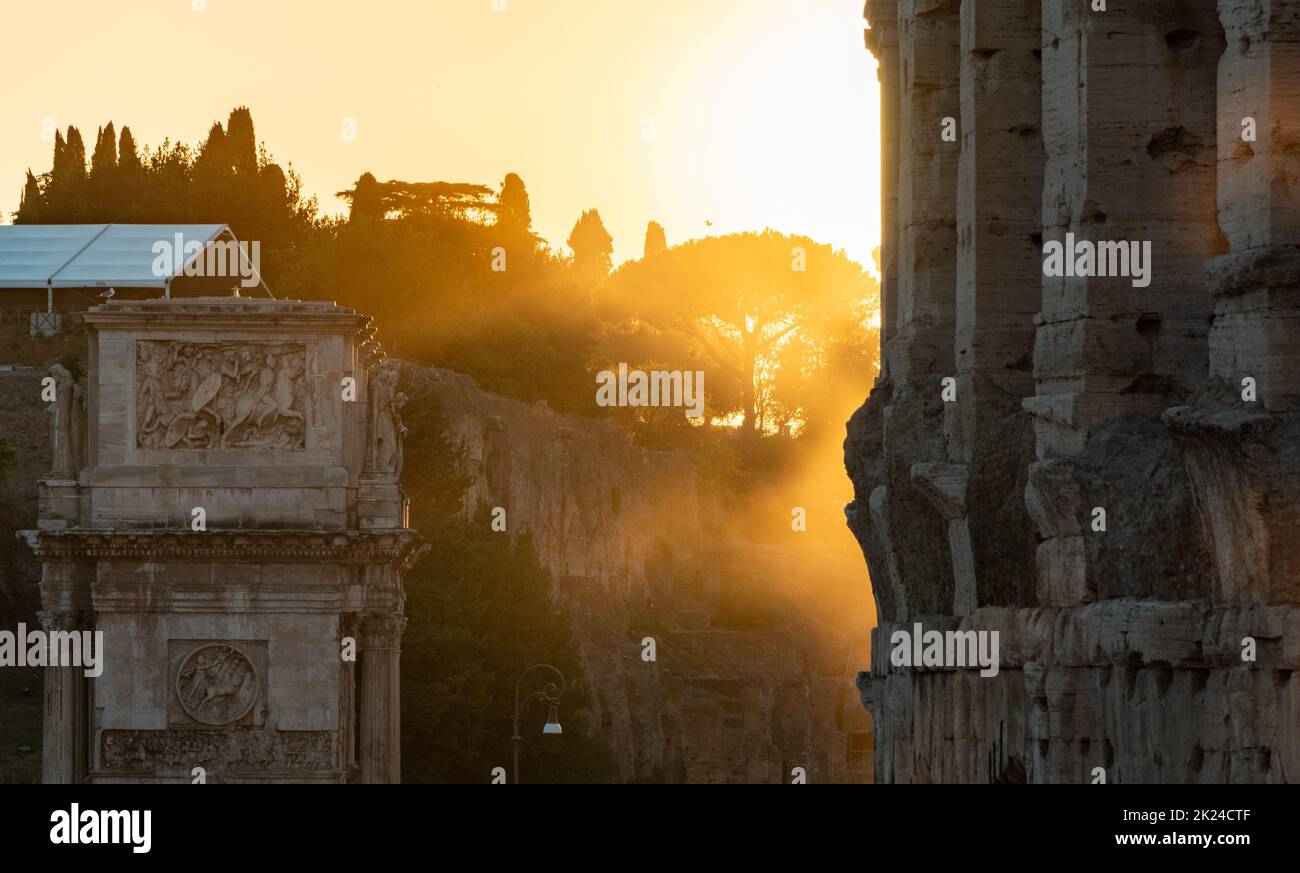 A picture of the sunset shining on the Colosseum's facade Stock Photo ...
