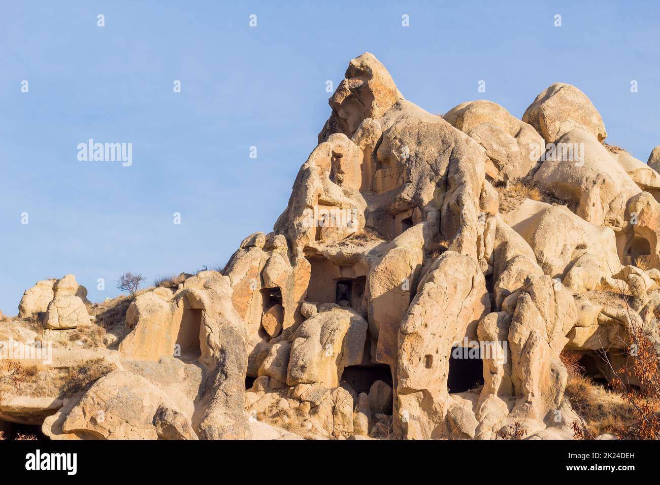 View of house carved in cave. Ruins of an ancient cave house ...