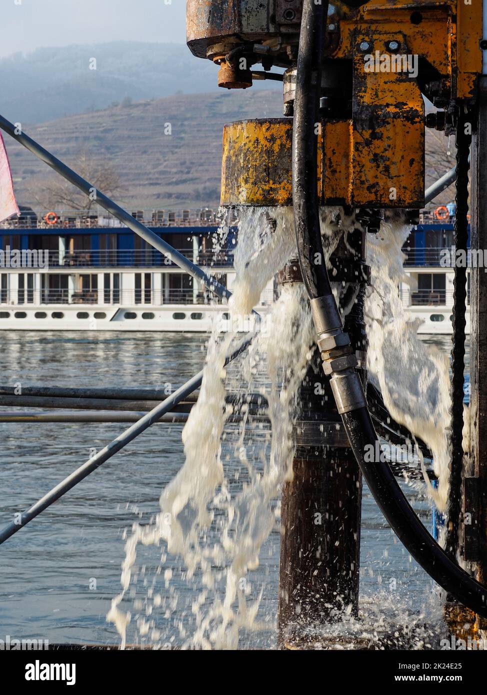 Working with a small bored pile machine on the water Stock Photo - Alamy